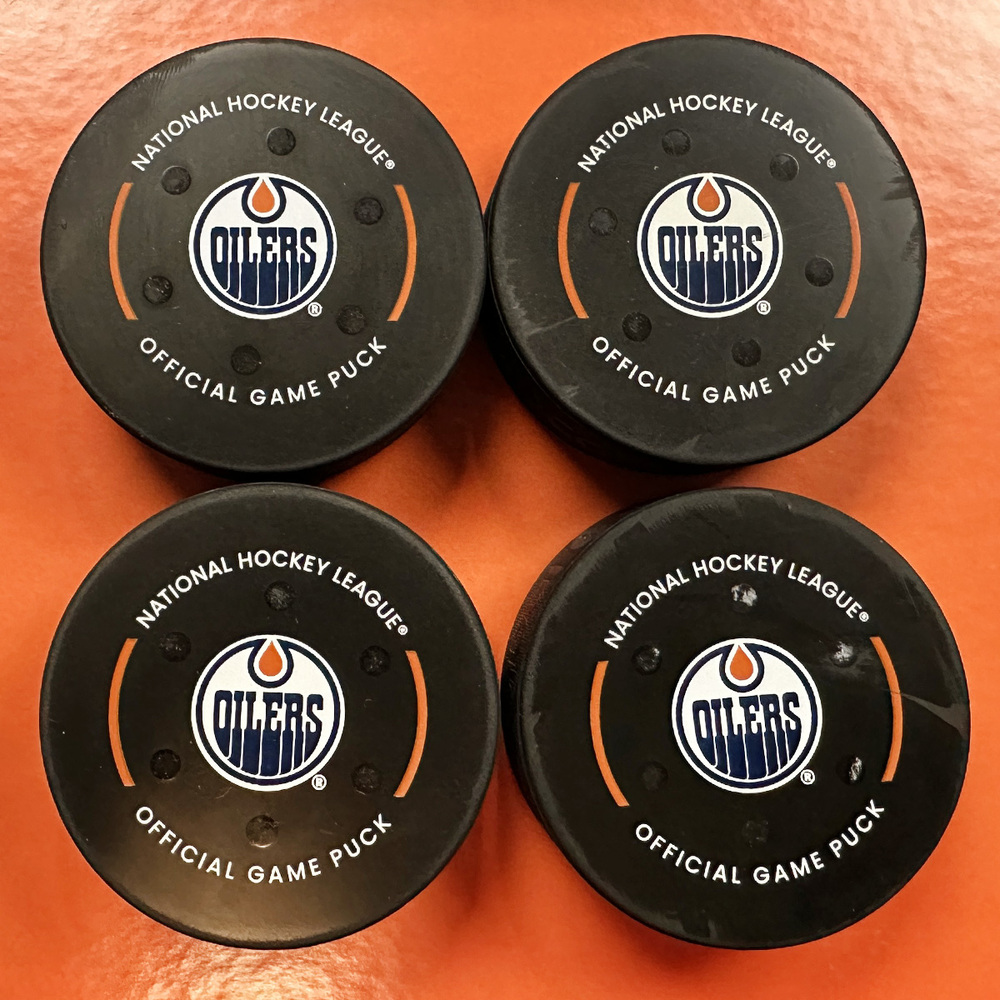 Collection Of Four New Jersey Devils Goal Pucks (Jesper Bratt #63, Ryan ...