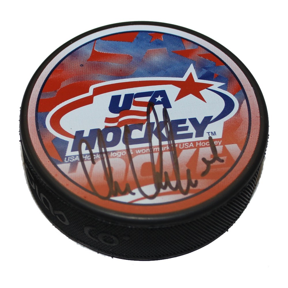 Chris Chelios Autographed USA Puck - NHL Auctions