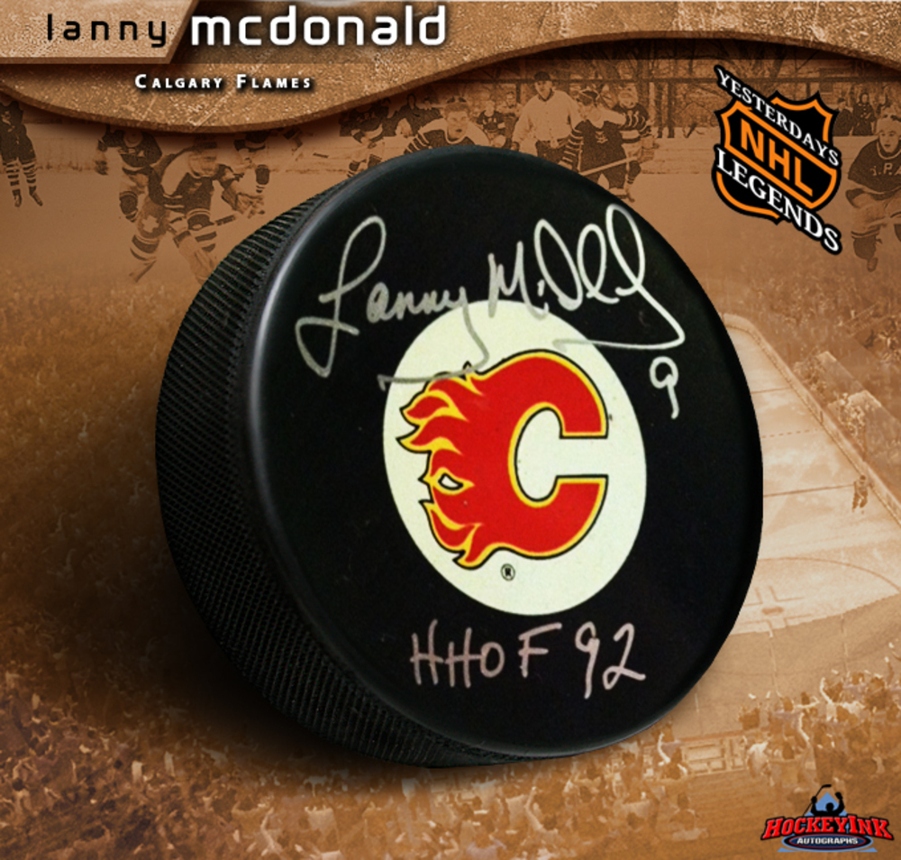 LANNY MCDONALD Signed Calgary Flames Puck - NHL Auctions