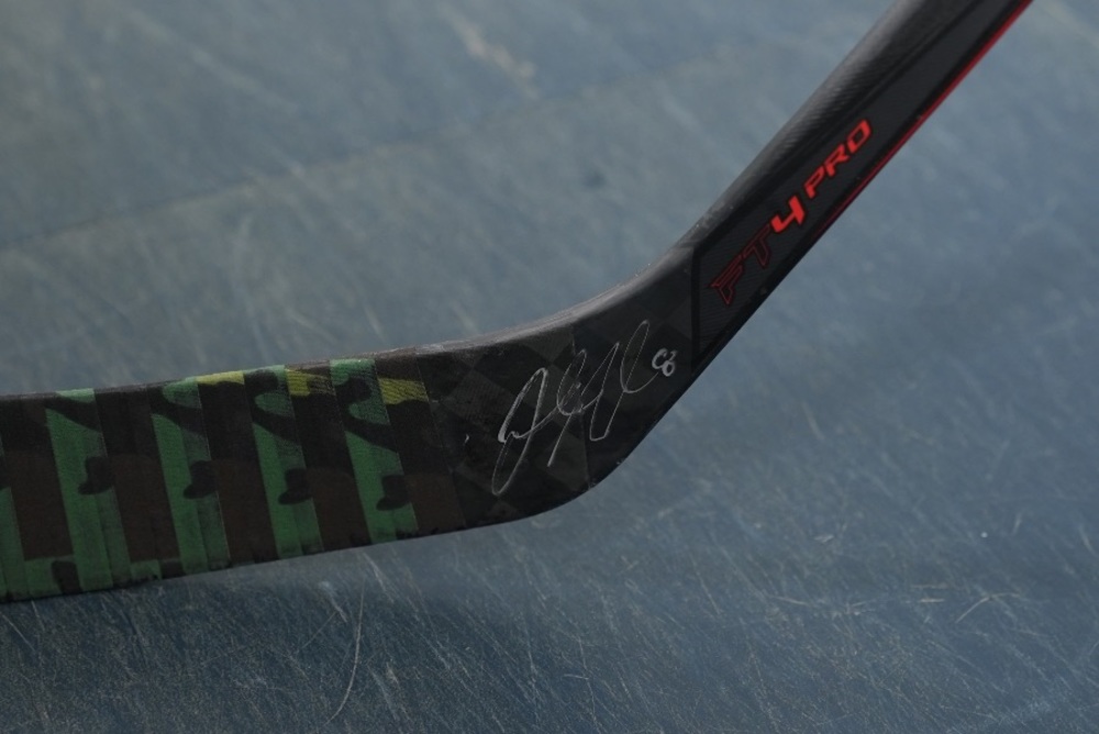 Warm-up stick used and signed by #8 Jacob Trouba on Military ...