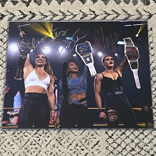 Raquel Gonzalez, Bianca Belair, and Rhea Ripley SIGNED 16x20 Photo (Auction 2) | WWE Auction