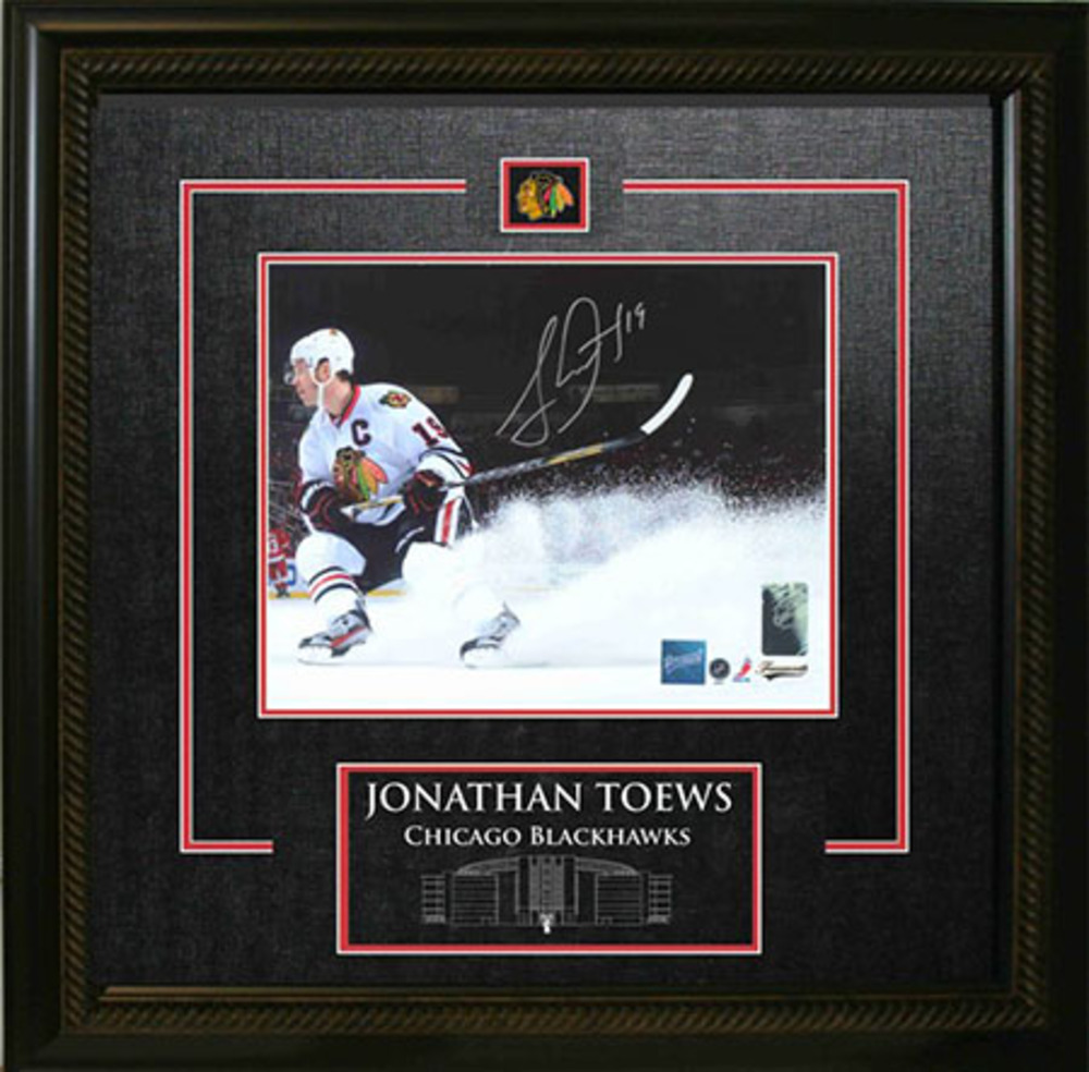 Jonathan Toews Autographed 8x10 "Ice Spray" Photo - NHL Auctions