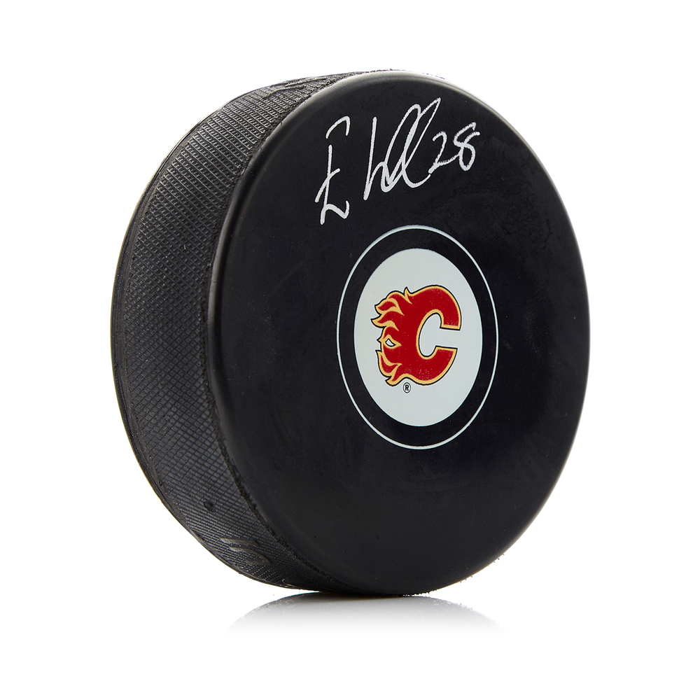 Elias Lindholm Autographed Calgary Flames Hockey Puck - NHL Auctions