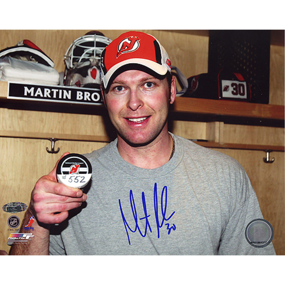 Martin Brodeur Pose With 552nd Puck 8x10 Photo - NHL Auctions