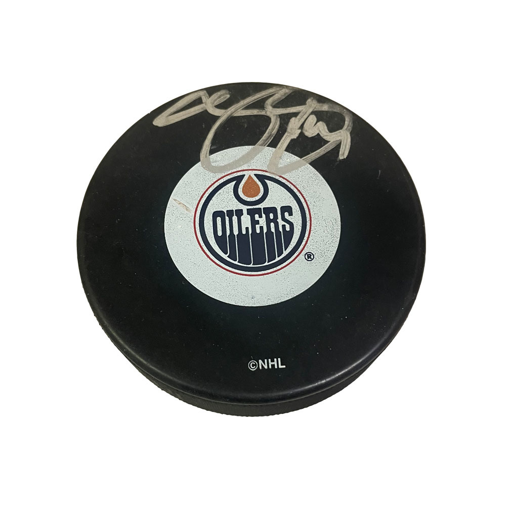 CHRIS PRONGER Signed Edmonton Oilers Puck (Exact Puck Shown) - NHL Auctions
