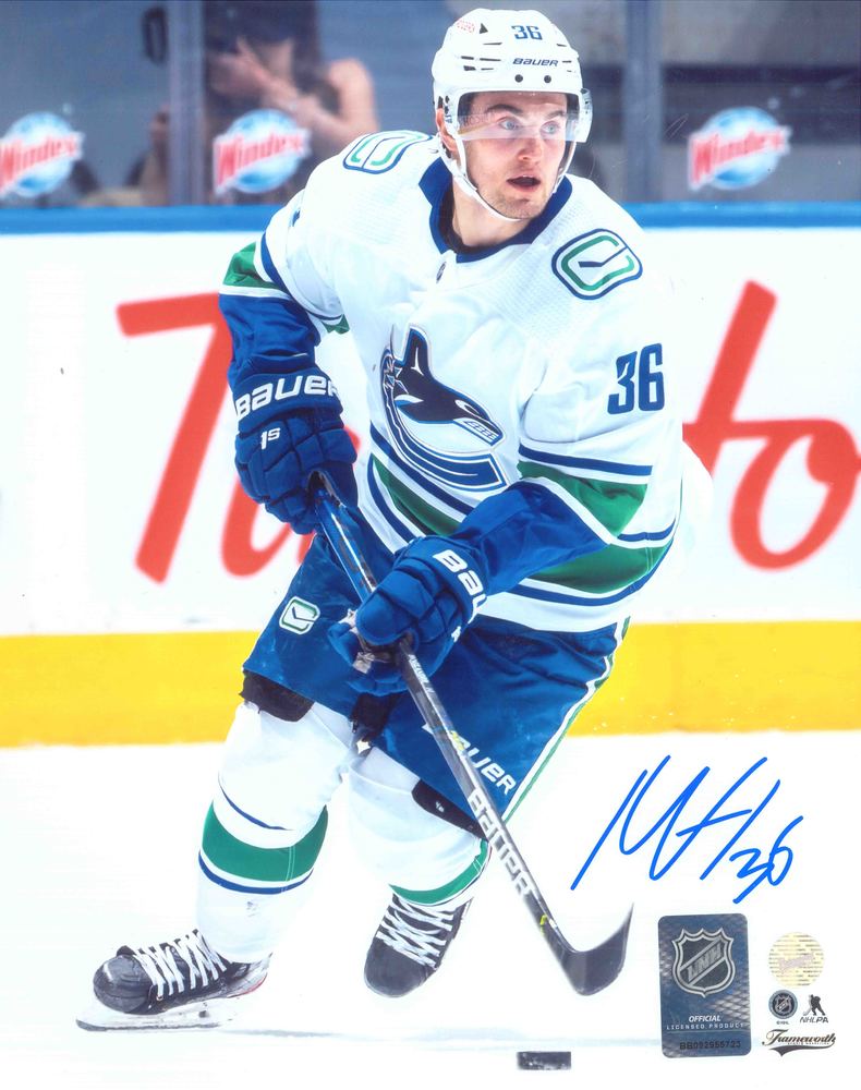 Nils Hoglander Vancouver Canucks Signed 8x10 Action Photo - NHL Auctions