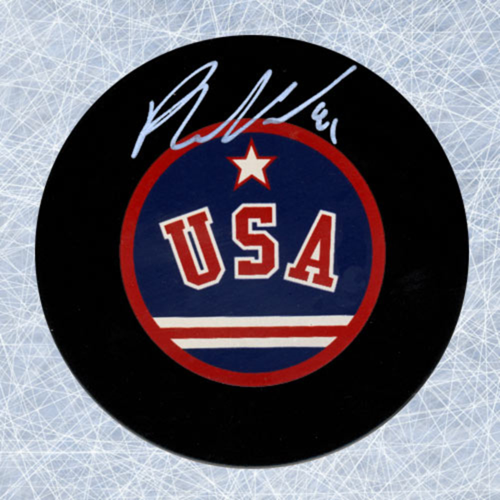 PHIL KESSEL Autographed Team USA Hockey Puck - NHL Auctions