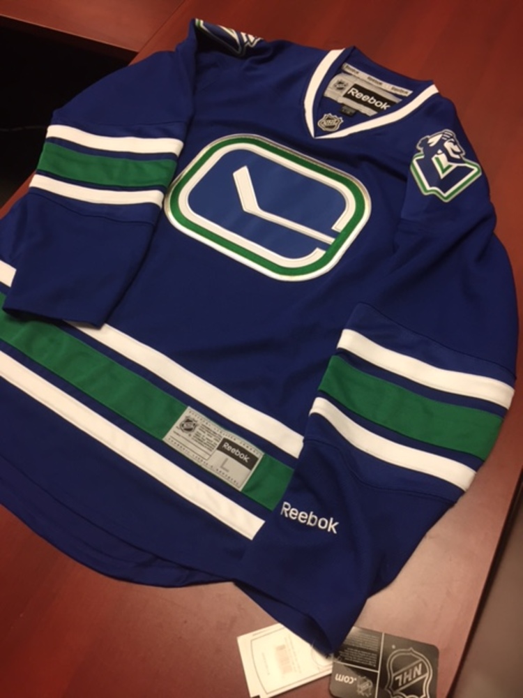 Vancouver Canucks - Unsigned Blue Reebok Jersey - SIZE LARGE - NHL Auctions