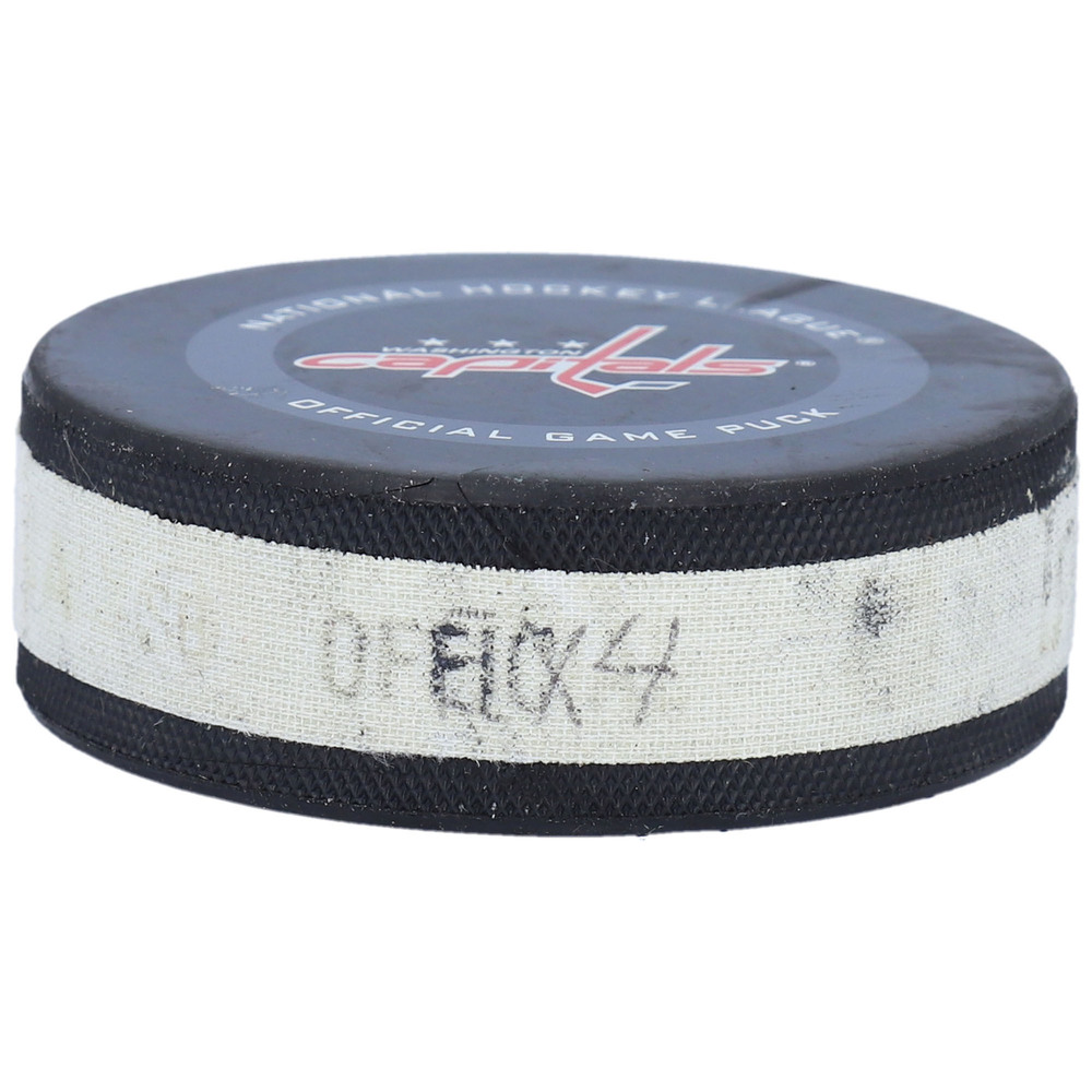 Game-Used Puck from the Game Between the Carolina Hurricanes and ...