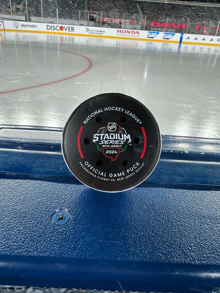 Brendan Smith 2024 Stadium Series Game-Used Goal Puck - NHL Auctions