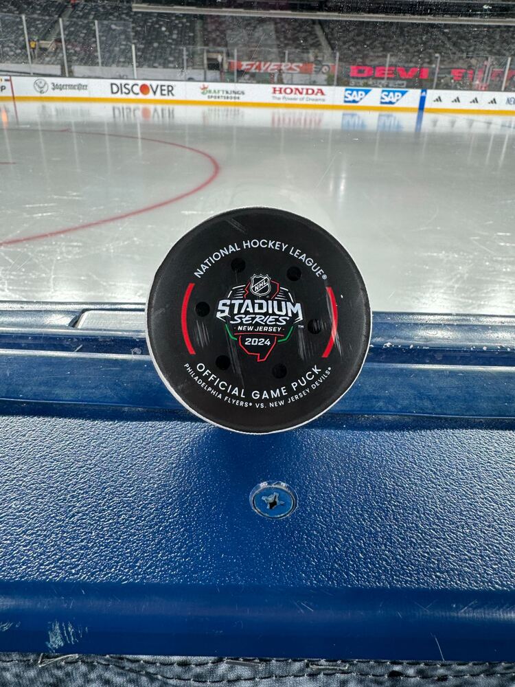 Nathan Bastian 2024 Stadium Series Game-Used Goal Puck - NHL Auctions