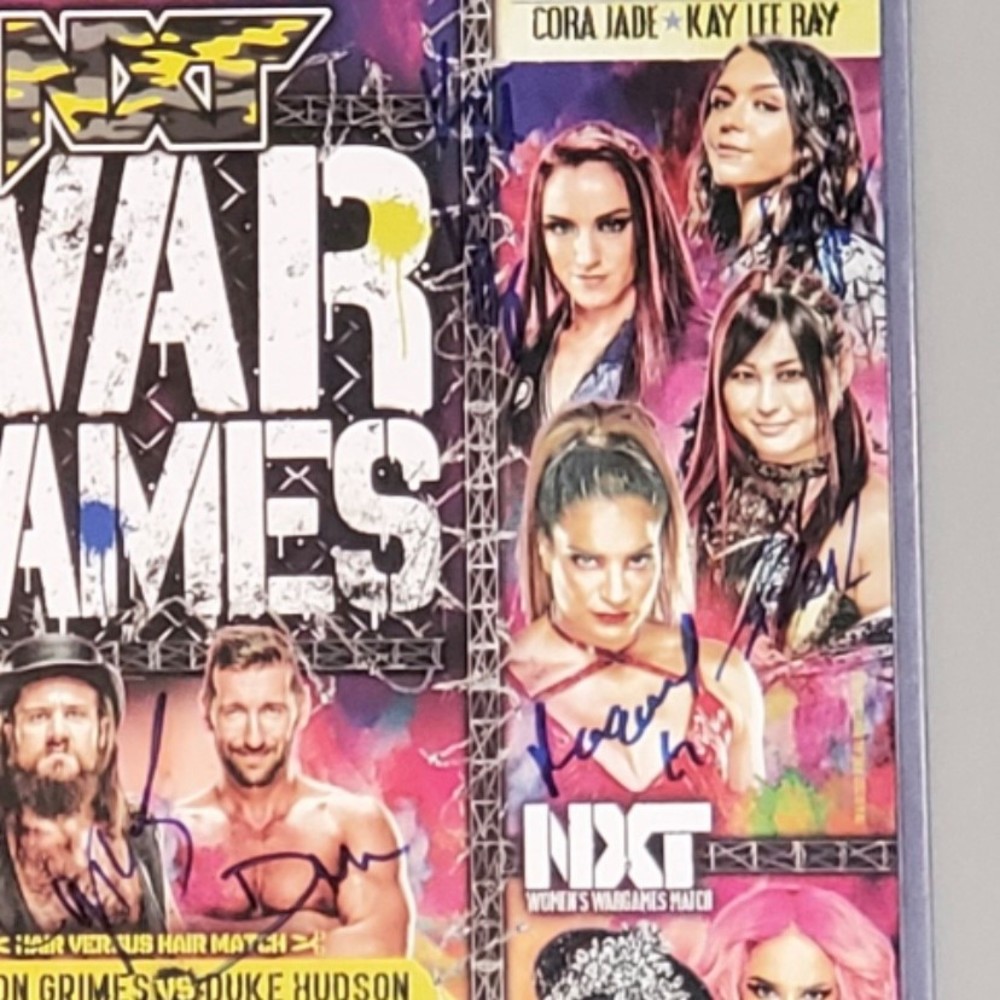 SIGNED and NUMBERED NXT WarGames 2021 Fight Card (#1 of 50) | WWE Auction