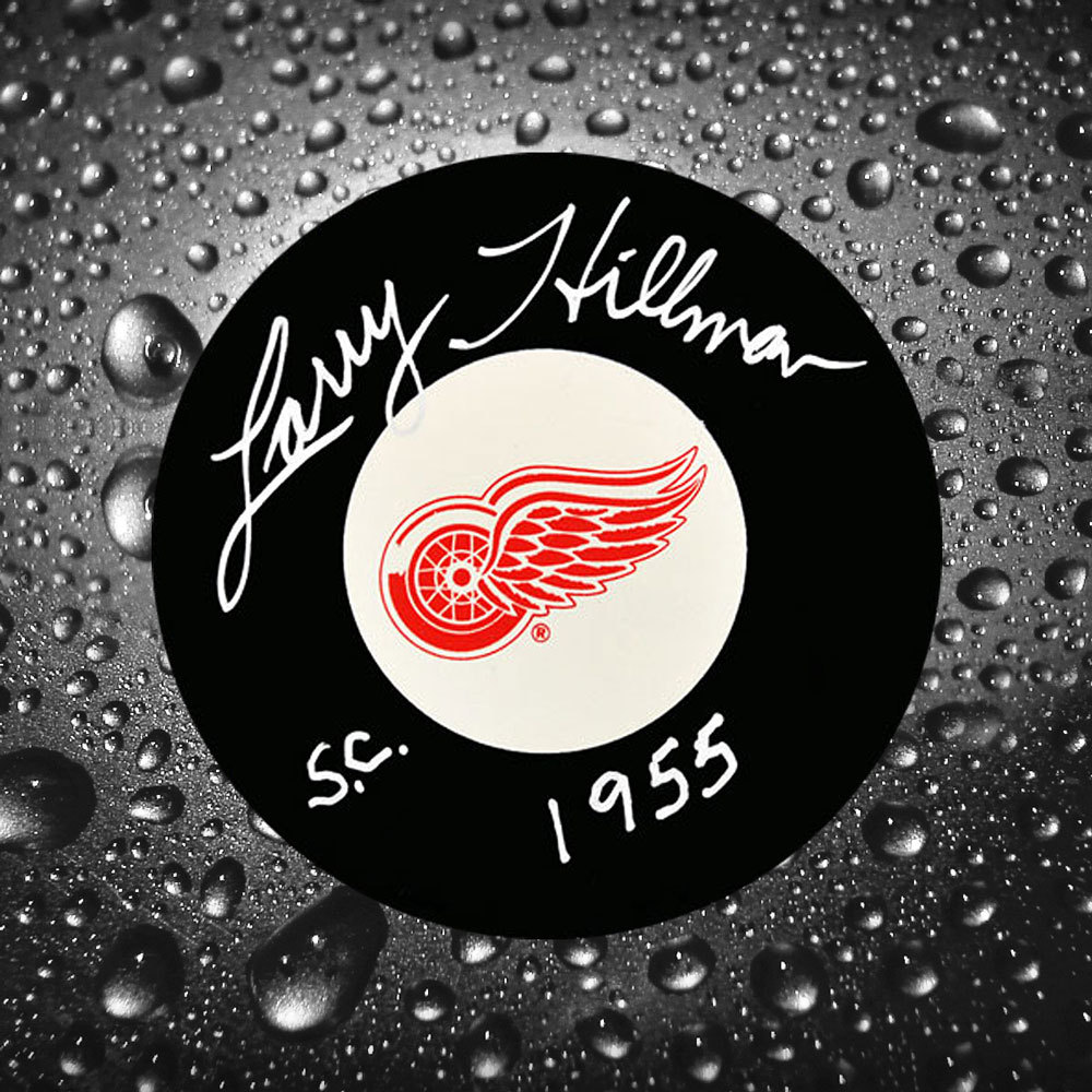 Larry Hillman Autographed Puck with S.C. 1955 Inscription - NHL Auctions